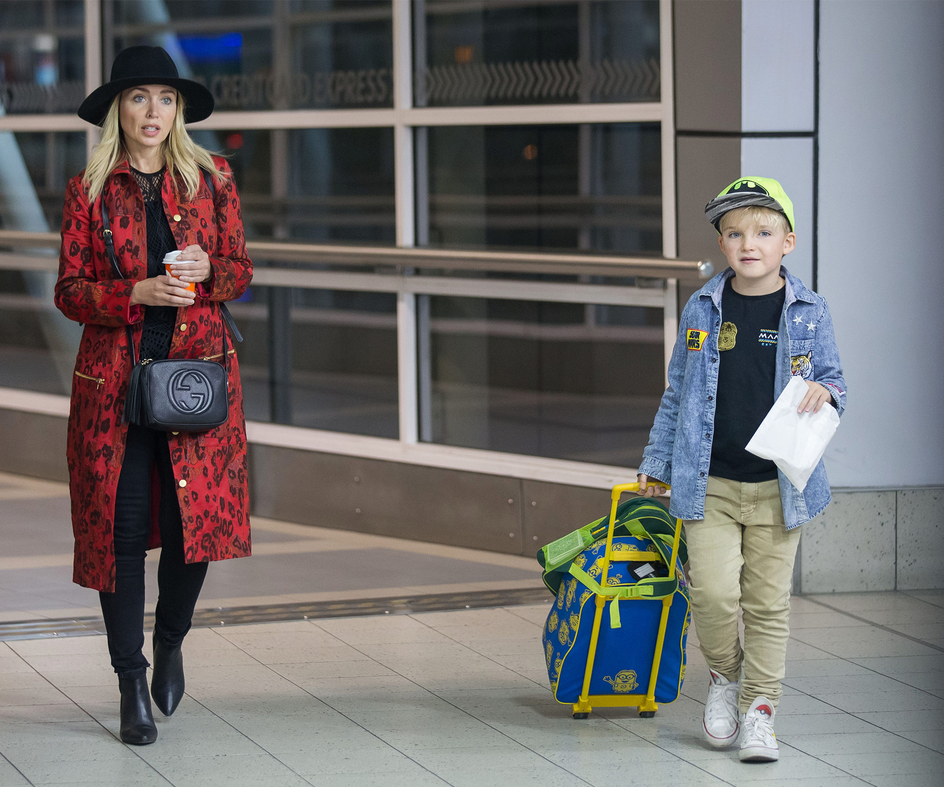 Dannii Minogue and son Ethan at the airport