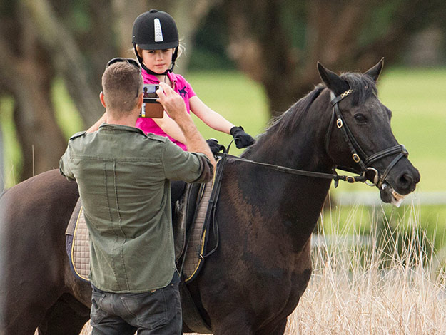 Celebrity chef Pete Evans takes his daughters horse riding